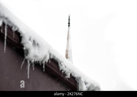 mosque minaret and it's snowing, hard winter in turkey,it's snowing, it ...