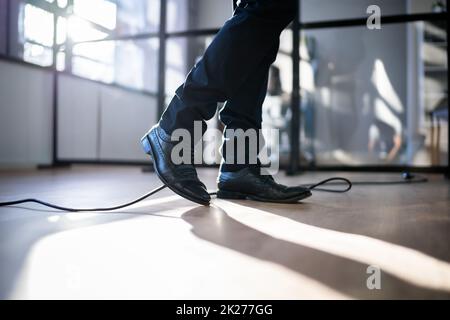 Stumble And Fall Over Wire Stock Photo - Alamy