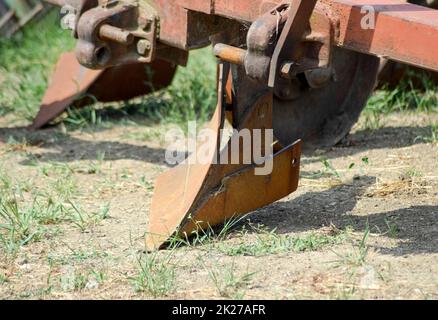 Plow on trailer for tractor. Plow for plowing soil Stock Photo - Alamy