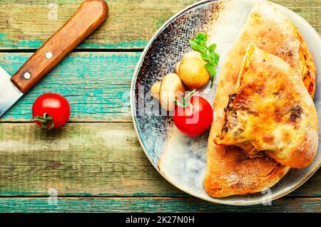 Calzone - Italian pie, pizza Stock Photo - Alamy