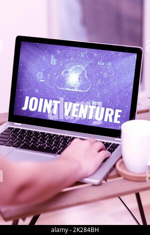Sign displaying Joint Venture. Internet Concept Collaboration ...