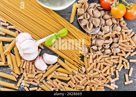 Pasta different whole grain and rye on board Stock Photo - Alamy