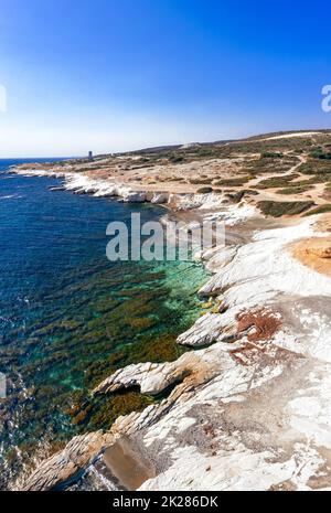 An aerial view of the rocky shore of Cyprus with foamy sea waves Stock ...