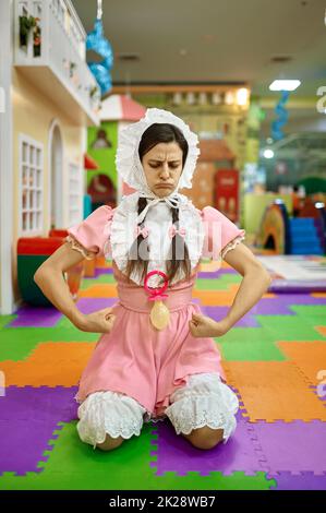 Funny cute woman baby showing muscle Stock Photo - Alamy