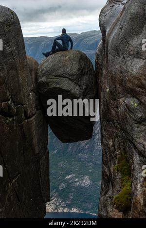 Visiting Norway Kjeragbolten located south of Lysefjorden Stock Photo - Alamy