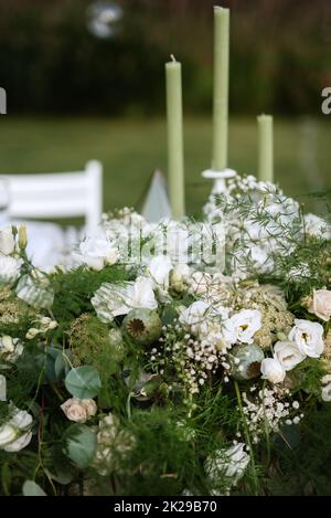 Burning candles on the dark wooden surface Stock Photo - Alamy