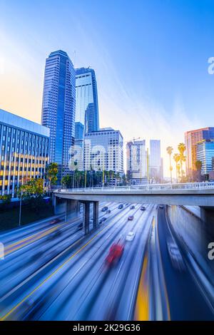 Los Angeles skyline with rush hour traffic at sunset Stock Photo - Alamy