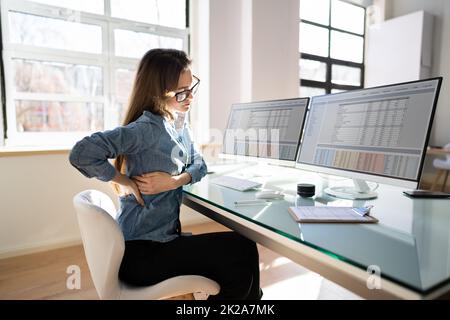 Back Pain Bad Posture Woman Sitting In Office Stock Photo - Alamy