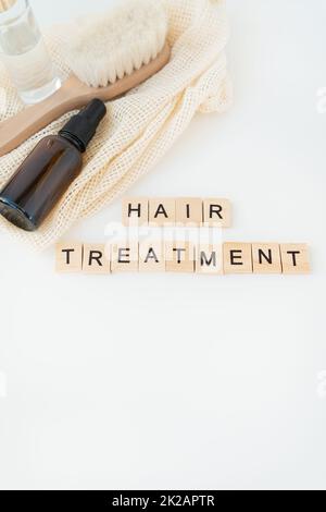 Hand with hair comb and hair brush, hair loss concept Stock Photo - Alamy