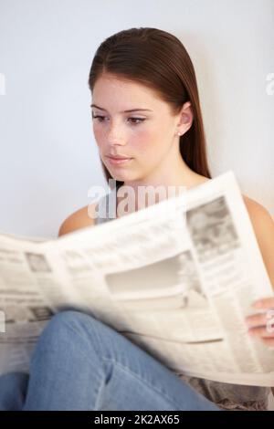 Beautiful woman reading morning paper and drinking coffee Stock Photo ...