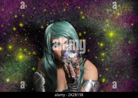 Psychic Woman With Blue Hair and crystal ball Stock Photo - Alamy
