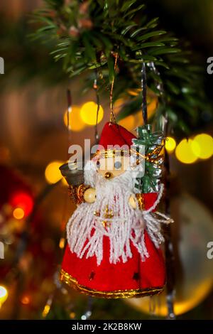 Christmas tree ornaments hanging on tree. Christmas decorations concept ...