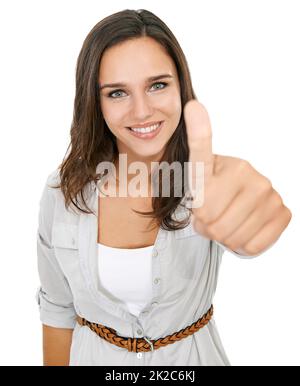 I whole-heartedly support you. Studio portrait of a young woman giving ...