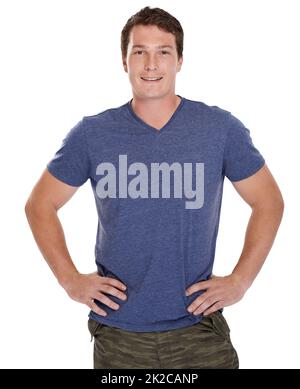 Casually handsome. A cropped portrait of a handsome young man pointing ...