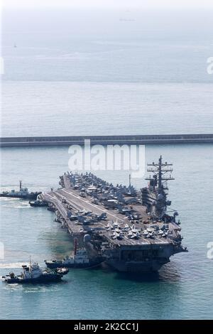 Busan, South Korea. 23rd Sep, 2022. A U.S. Navy sailor walks on the USS ...