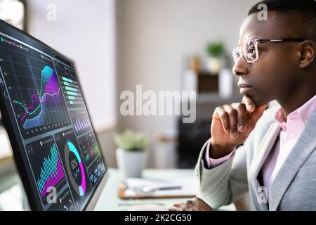 Predictive Business Analytics. African American Analyst Stock Photo - Alamy