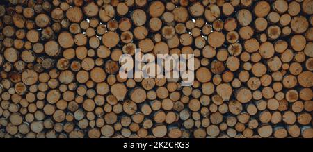 Stack of tree trunks. Texture background wallpaper Stock Photo - Alamy