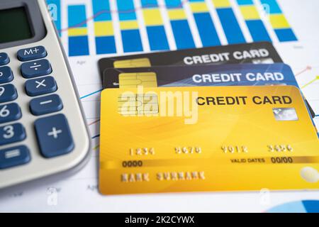 Credit card on chart and graph paper. Finance development, Banking ...