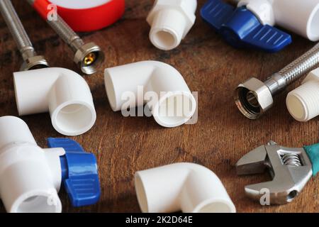 Plumbing tools and equipmentn on wooden background Stock Photo - Alamy