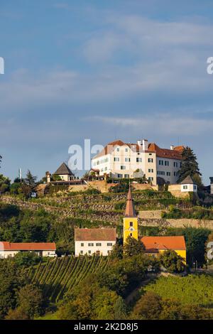 Kapfenstein castle and church with vineyard, Styria, Austria Stock ...