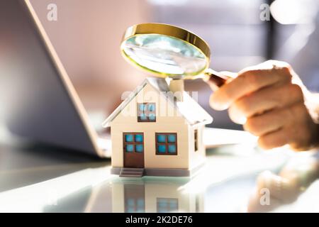 Real Estate House Inspector Checking Property Using Magnifying Glass ...