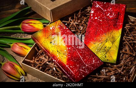 Handmade chocolate dyed with colored cocoa butter Stock Photo - Alamy