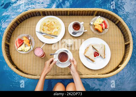 Top view of floating breakfast in the swimming pool, floating breakfast ...