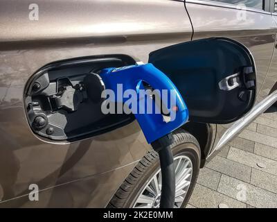 Car is refueled Stock Photo - Alamy