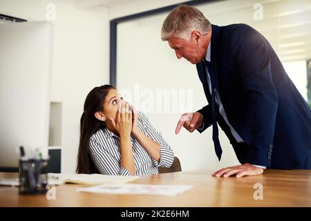Boss reprimanding his employee Stock Photo - Alamy