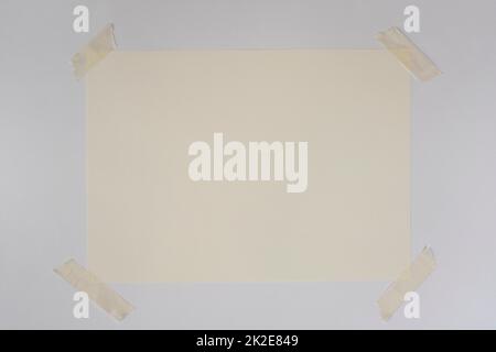 A blank sheet of paper is attached to a piece of cardboard Stock Photo ...