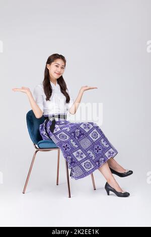 beautiful Korean woman in 20s wearing modern Hanbok smiling Stock Photo ...