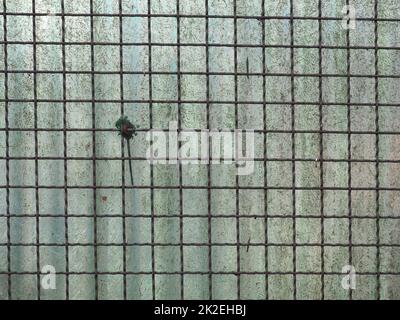 metal net and corrugated plastic fence background Stock Photo - Alamy