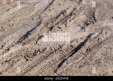 mud and dirty water puddle formed as a result of rain Stock Photo - Alamy
