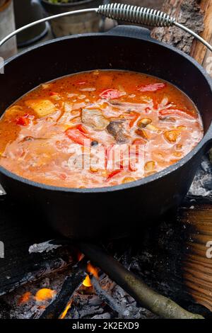 Kettle goulash is prepared over an open fire! Stock Photo - Alamy