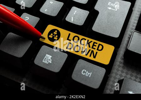 Sign displaying Locked Down. Word for emergency measure which people ...