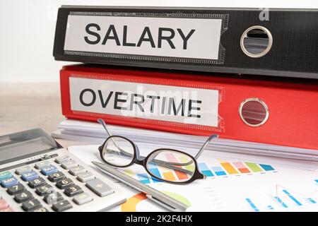 Salary overtime. Binder data finance report business with graph ...