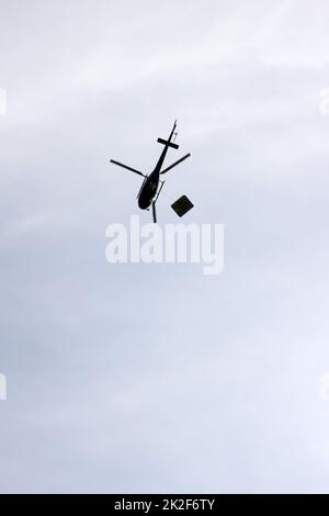 helicopter cargo flight Stock Photo - Alamy