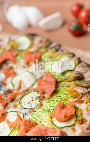 Italian traditional Pizza with salmon and cheese Stock Photo - Alamy