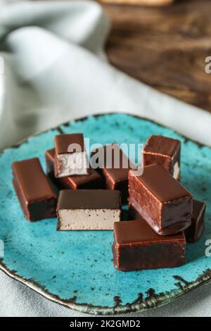 Delicious bird's milk candies on white background Stock Photo - Alamy