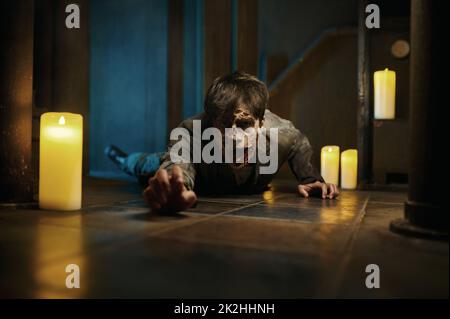 Spooky zombie man crawling on abandoned city. Halloween concept Stock ...