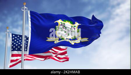 The Connecticut state flag waving along with the national flag of the ...