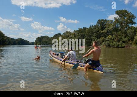 Canoe tour river swim Stock Photo - Alamy