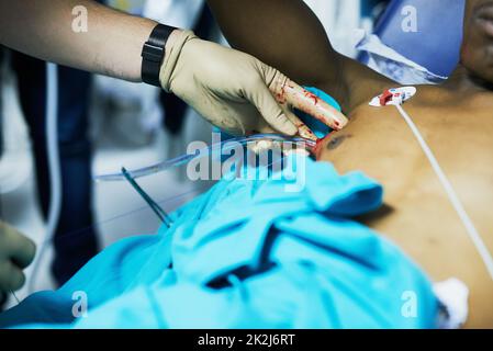 Restoring respiratory function with chest drainage. Cropped shot of a ...