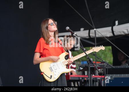 Polly Louise Mackey of Welsh band Art School Girlfriend playing a ...