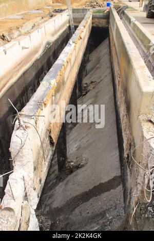 The water was pumped out in the sand trap in a sewage treatment plant ...