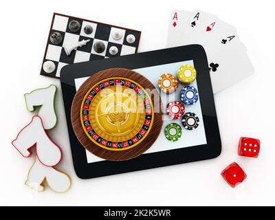 Tablet computer, playing cards, roulette,chips, dice Stock Photo - Alamy