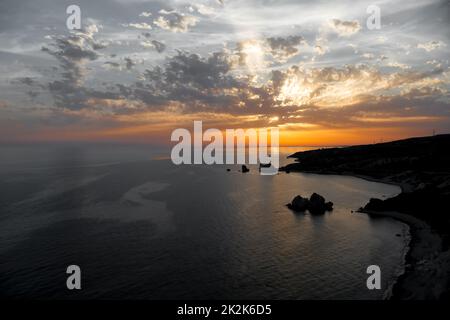 Sunset seascape near Aphrodite's Rock. Paphos District, Cyprus Stock ...