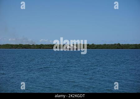 Floating bar with Manda Island in the background, Lamu Island, Kenya ...