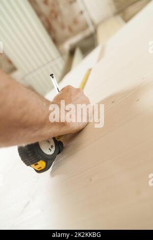 woodworker artisan in his workshop measuring Stock Photo - Alamy