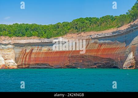 Red Cliffs Above Blue Waters on the Pictured Rocks National Lakeshore ...